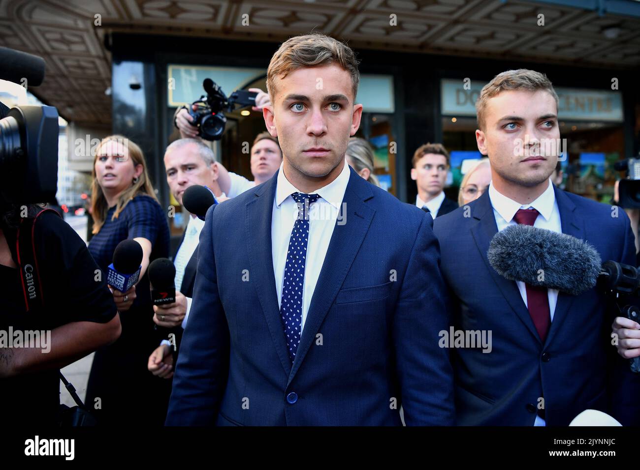 Callan Sinclair (left) leaves the Downing Centre District Court in ...