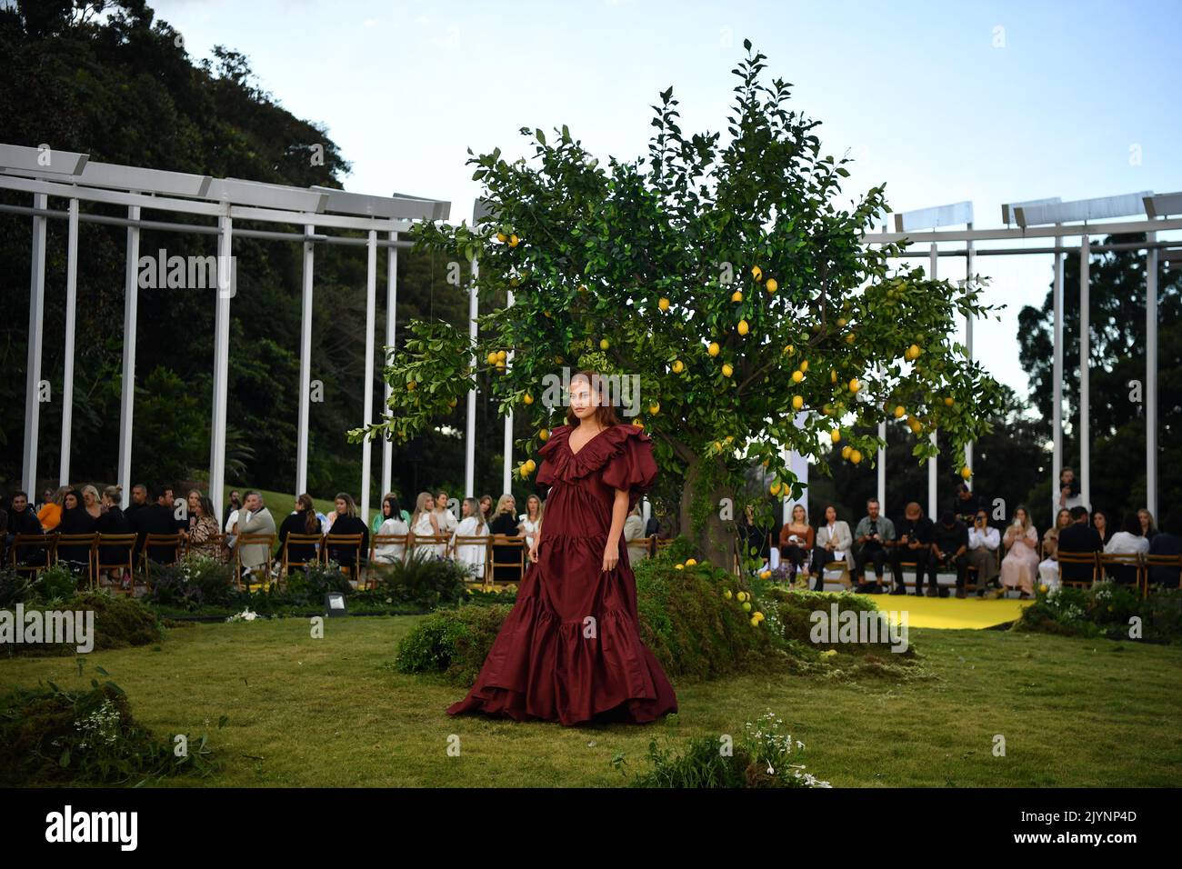 A model walks the runway during the Aje Resort 22 runway show at the ...