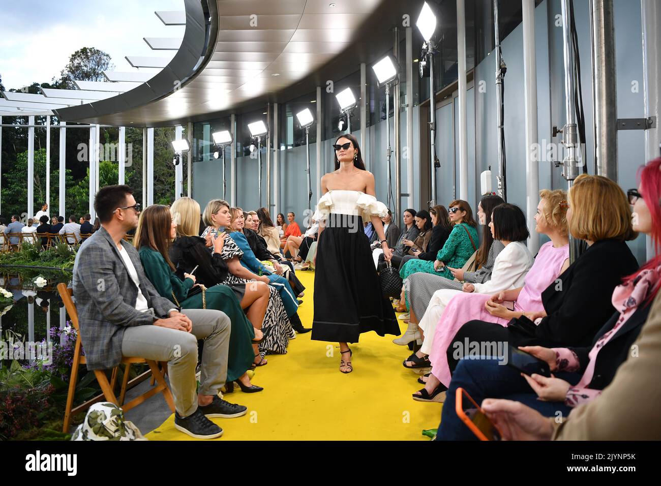 A model walks the runway during the Aje Resort 22 runway show at the ...