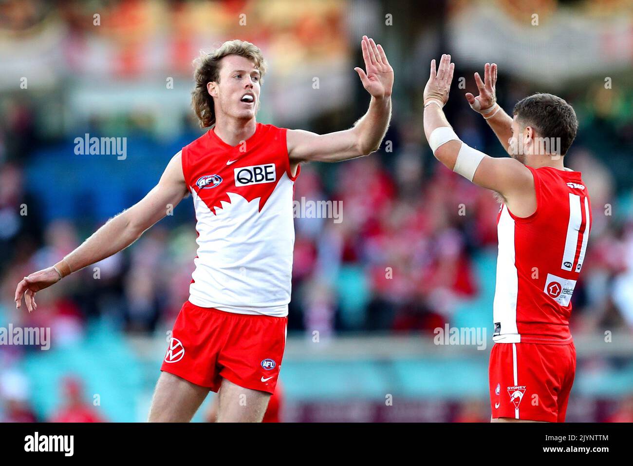 Nick Blakey of the Swans celebrates kicking a goal with team mate Tom ...