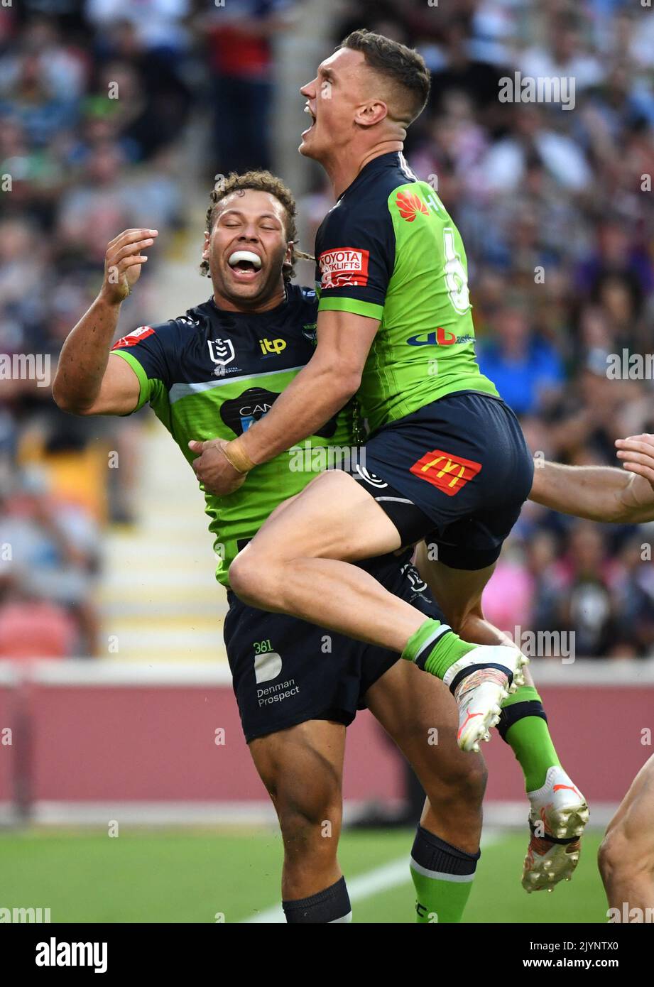 Sebastian Kris (left) of the Raiders celebrates scoring a try with Jack ...