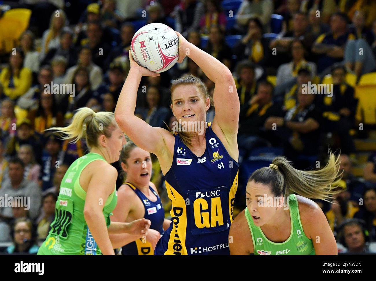 Stephanie Woods of the Lightning (centre) in action during the Round 3 ...