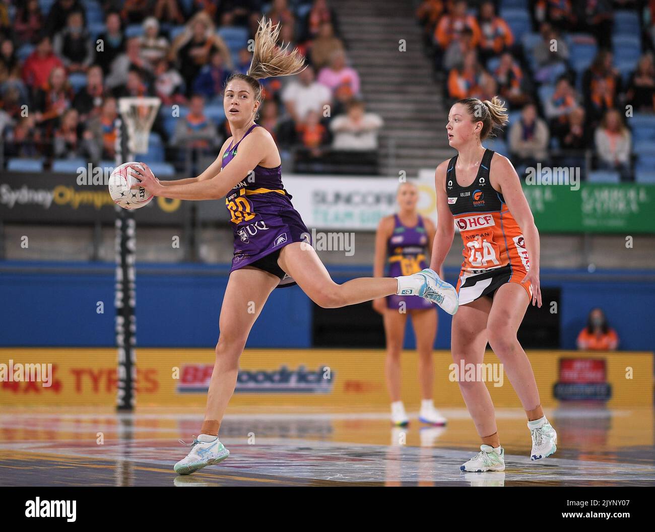 Kim Jenner of the Firebirds and Sophie Dwyer of the Giants in action ...