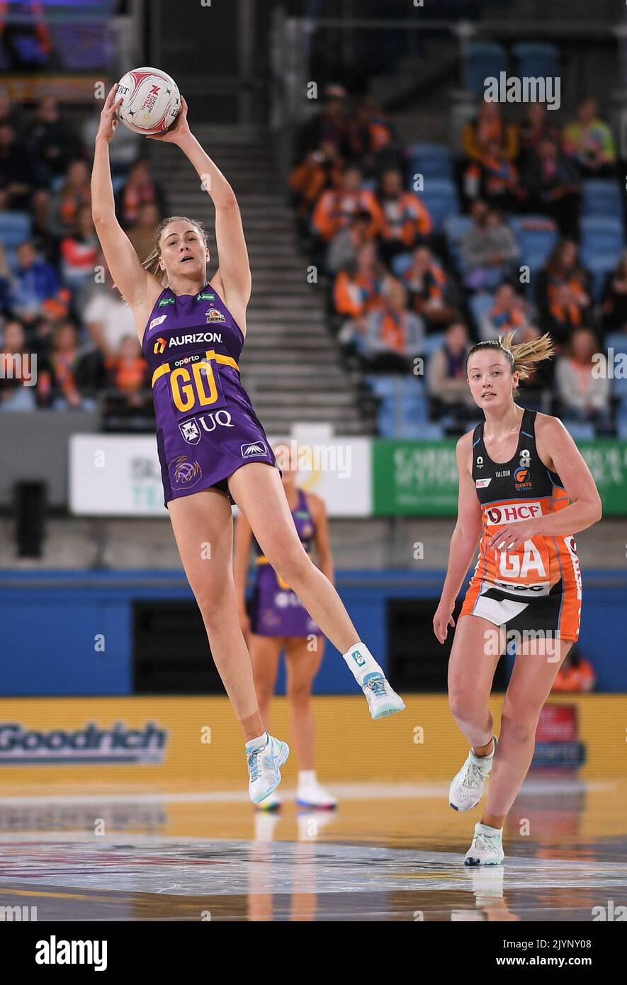 Kim Jenner of the Firebirds and Sophie Dwyer of the Giants in action ...