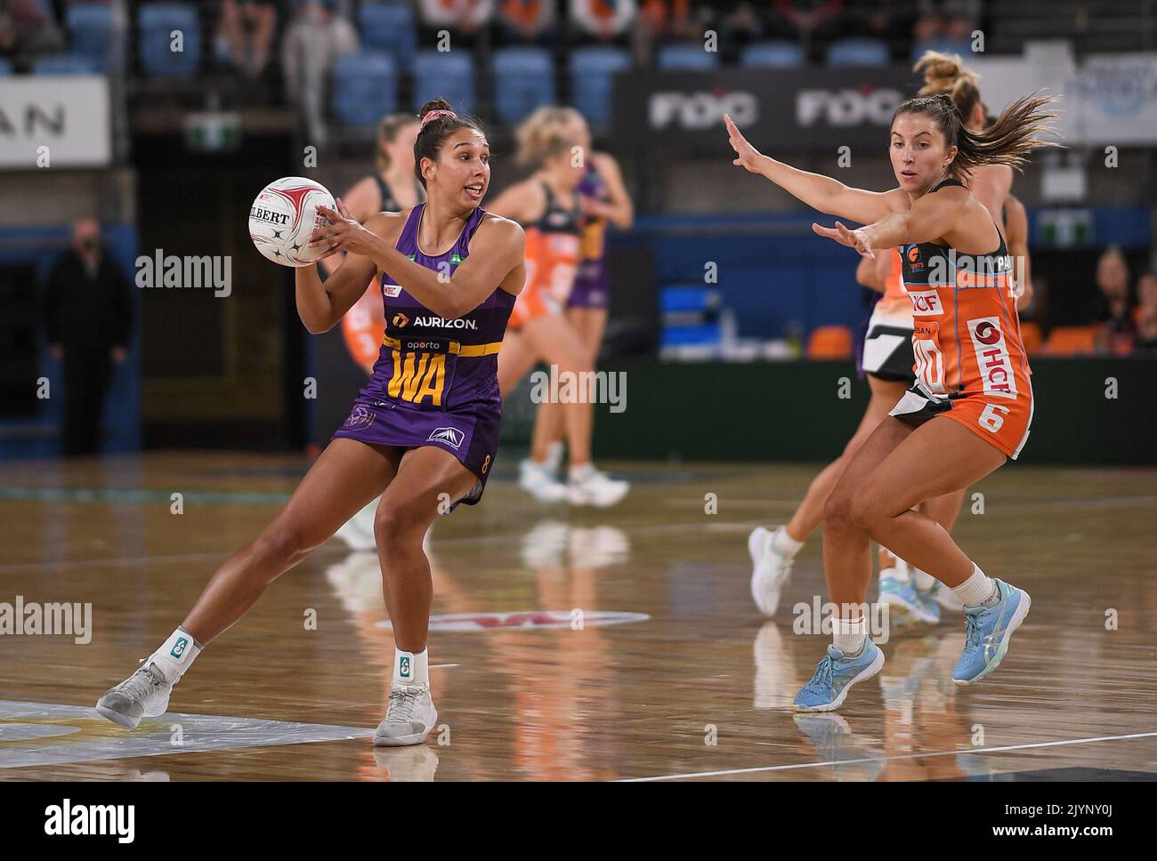 Jemma Mi Mi of the Firebirds and Amy Parmenter of the Giants in action ...
