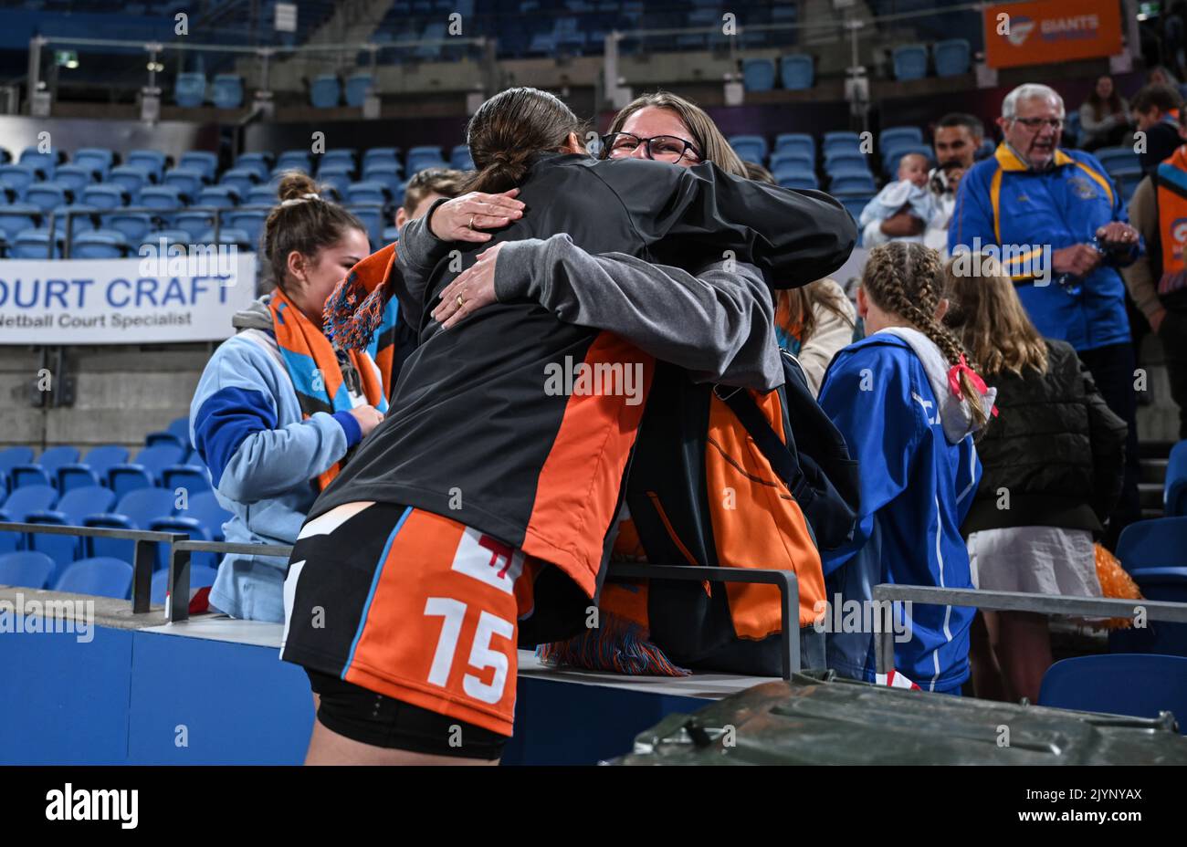 Amy Sligar of the Giants hugs a fan after the Round 3 Super Netball ...