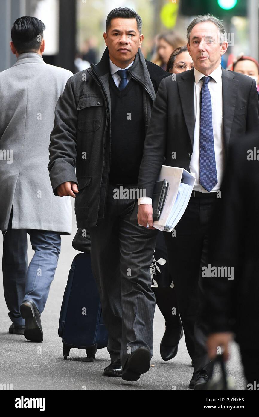 Simiona Tuteru (centre) arrives at the Melbourne Magistrates Court in ...