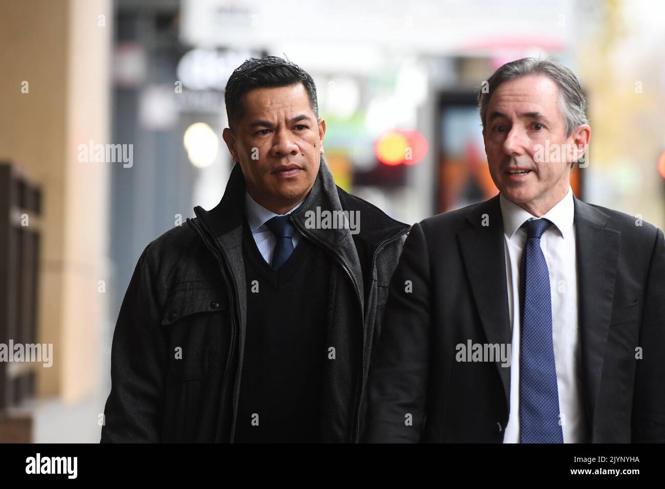 Simiona Tuteru (left) arrives at the Melbourne Magistrates Court in ...