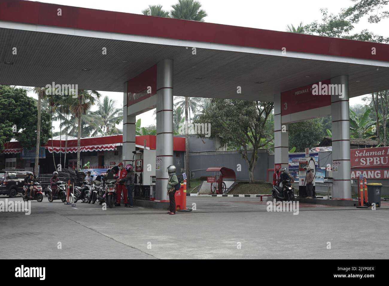 Semarang, Indonesia - September 3, 2022: Residents refuelling the ...