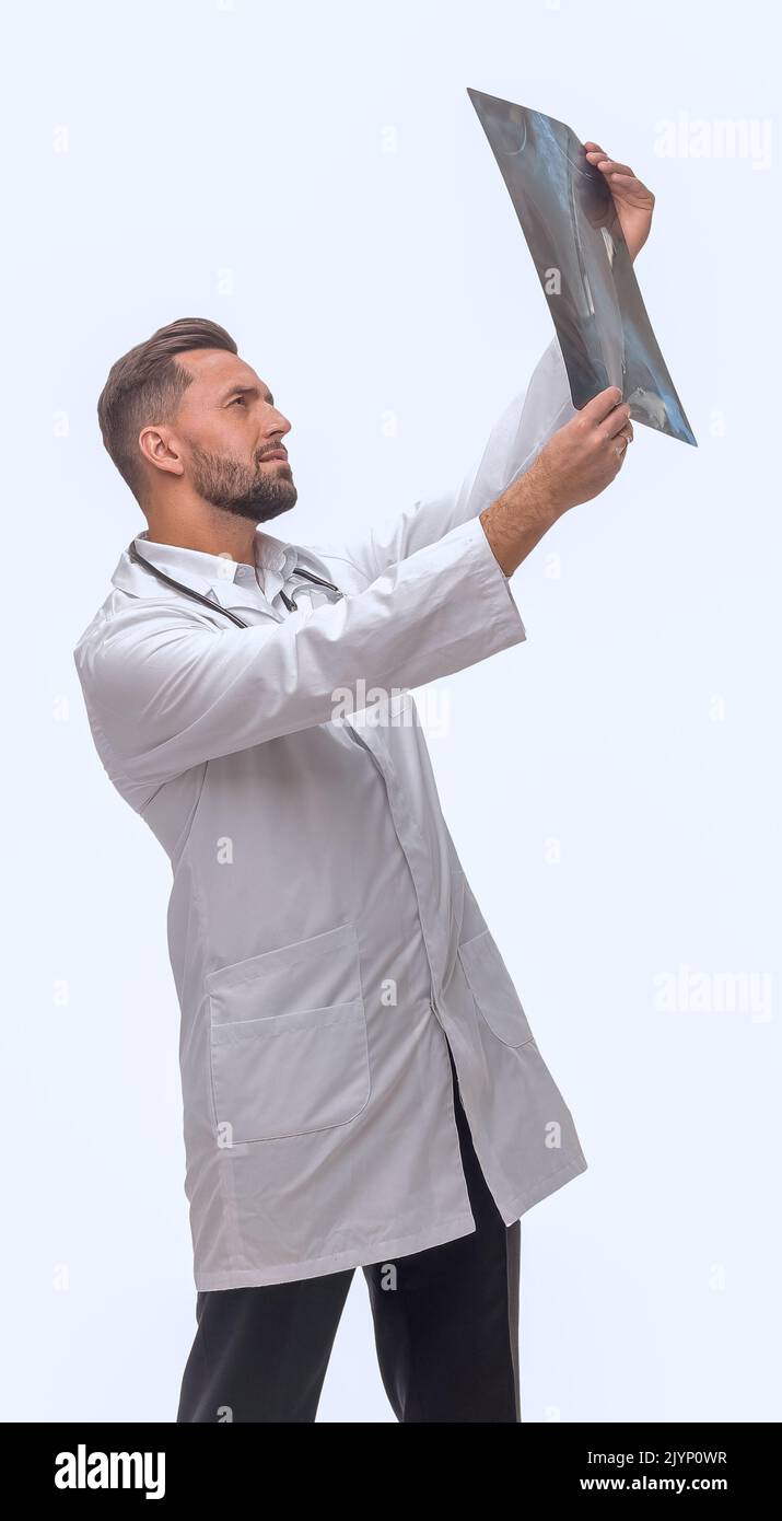 in full growth. medical doctor looking closely at the x-ray Stock Photo ...