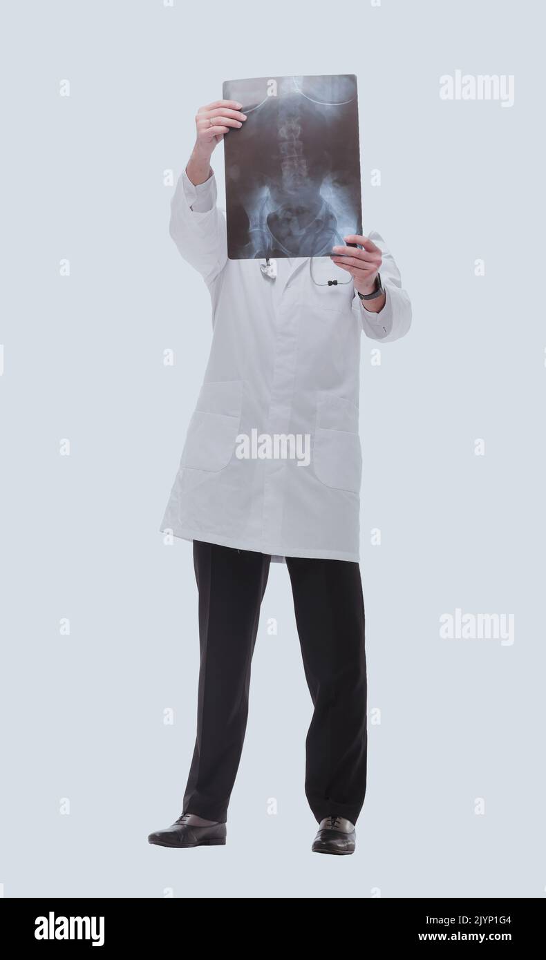 in full growth. medical doctor looking closely at the x-ray Stock Photo ...