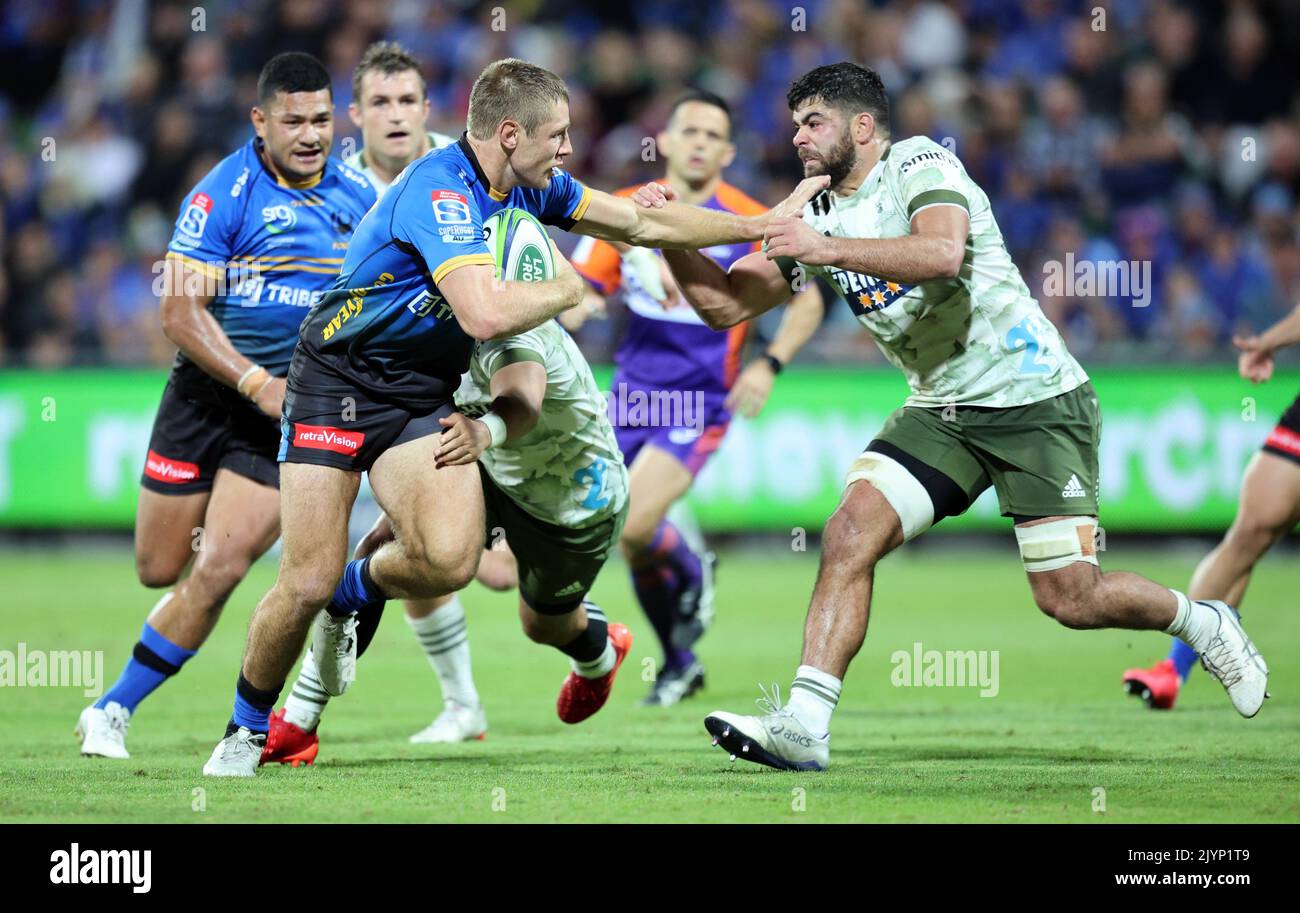 Kyle Godwin of the Force fends off Billy Harmon of the Highlanders ...