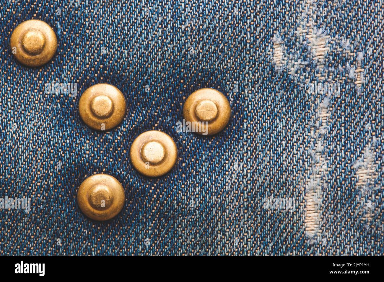 close-up of metal button, rivets on denim texture Stock Photo - Alamy