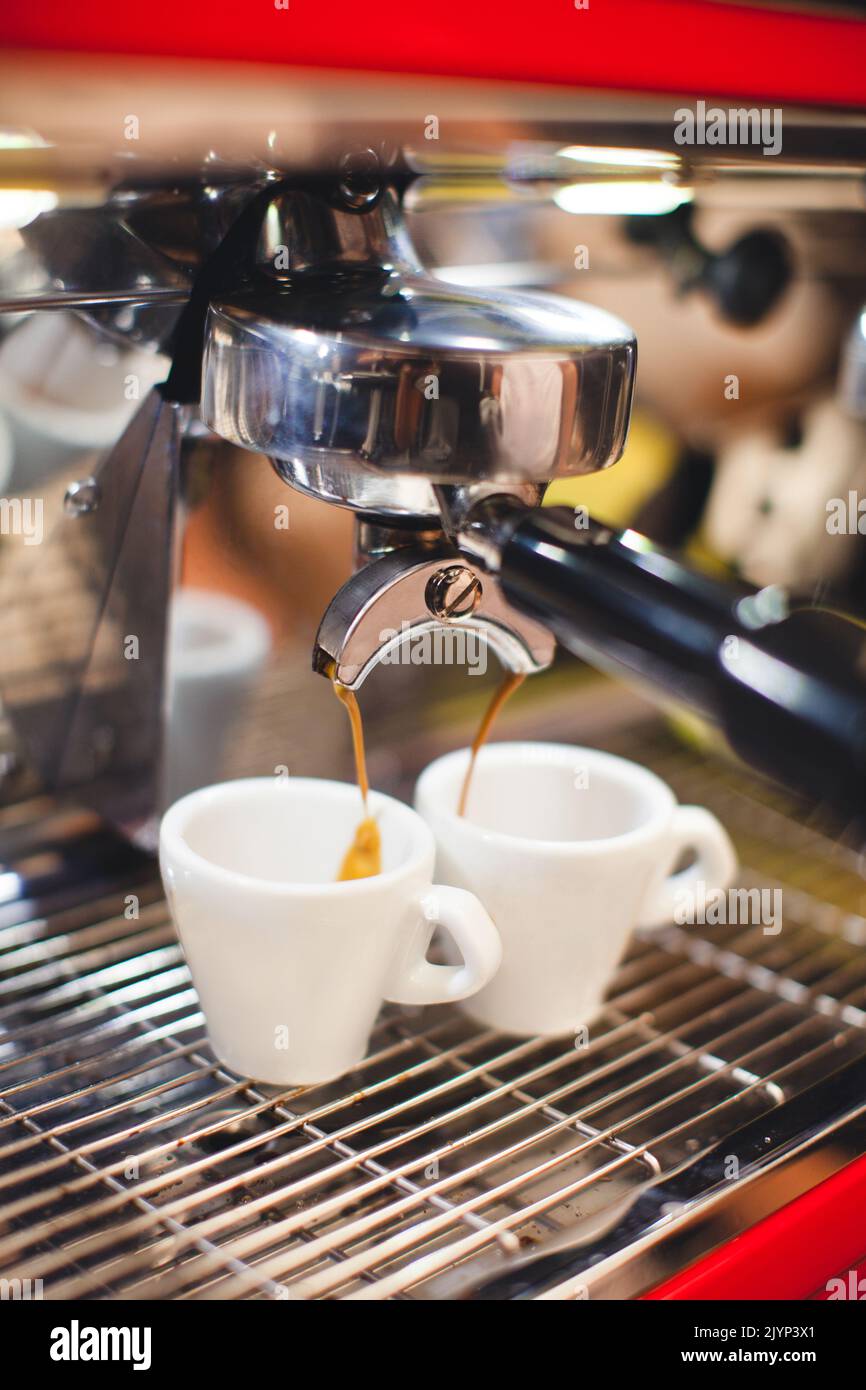 barista makes coffee in a coffee machine Stock Photo - Alamy