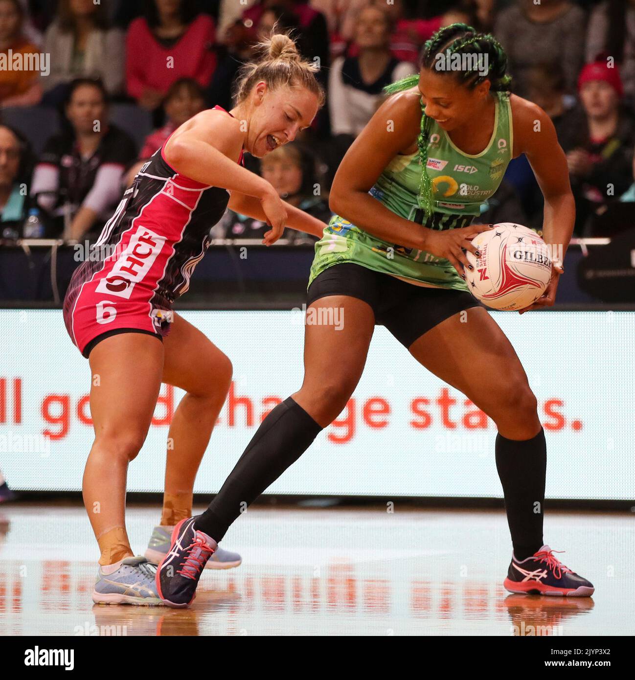 Hannah Petty of the Thunderbirds and Stacey Francis of the Fever share ...