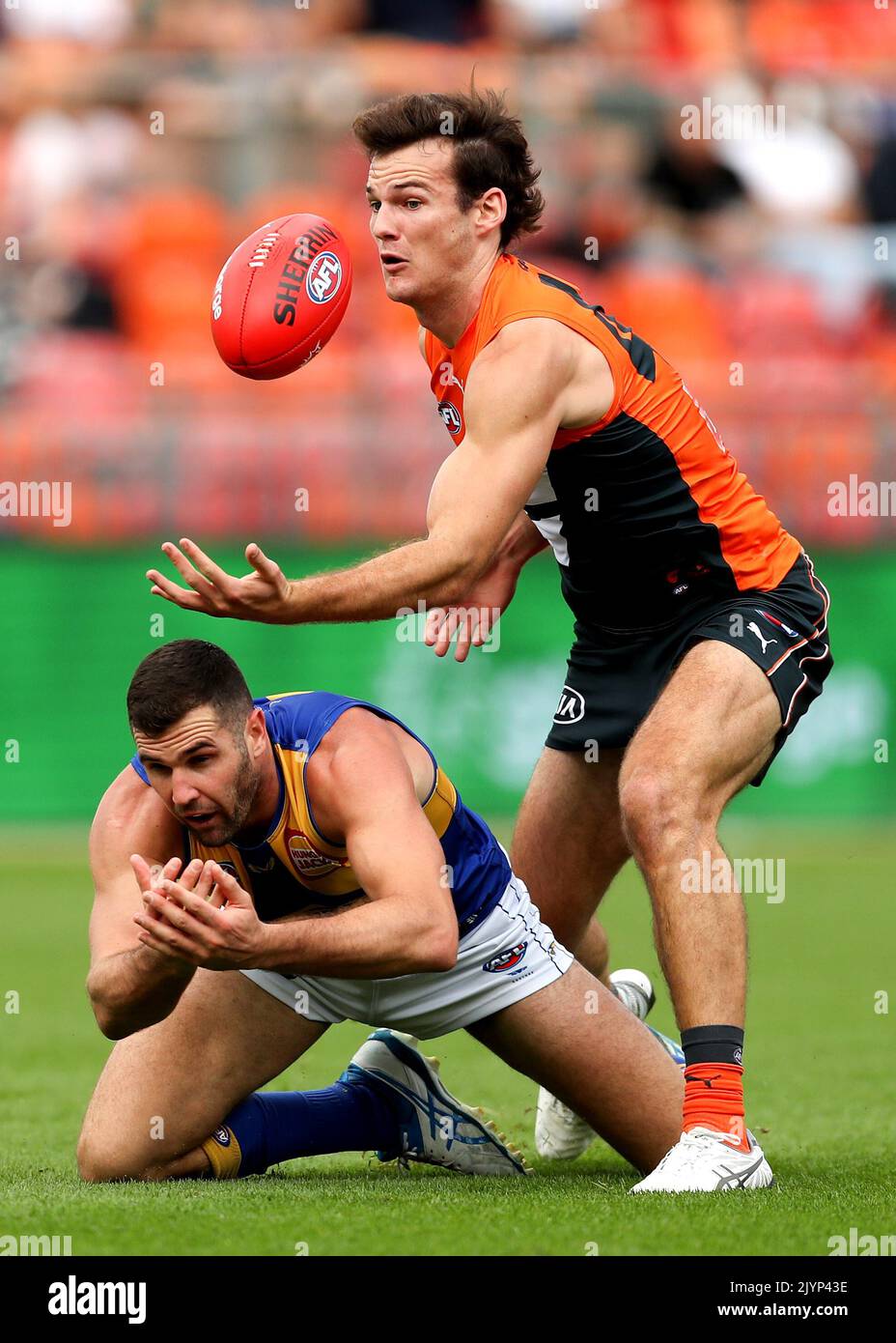 Jack Darling of the Eagles contests the ball with Jack Buckley of the ...
