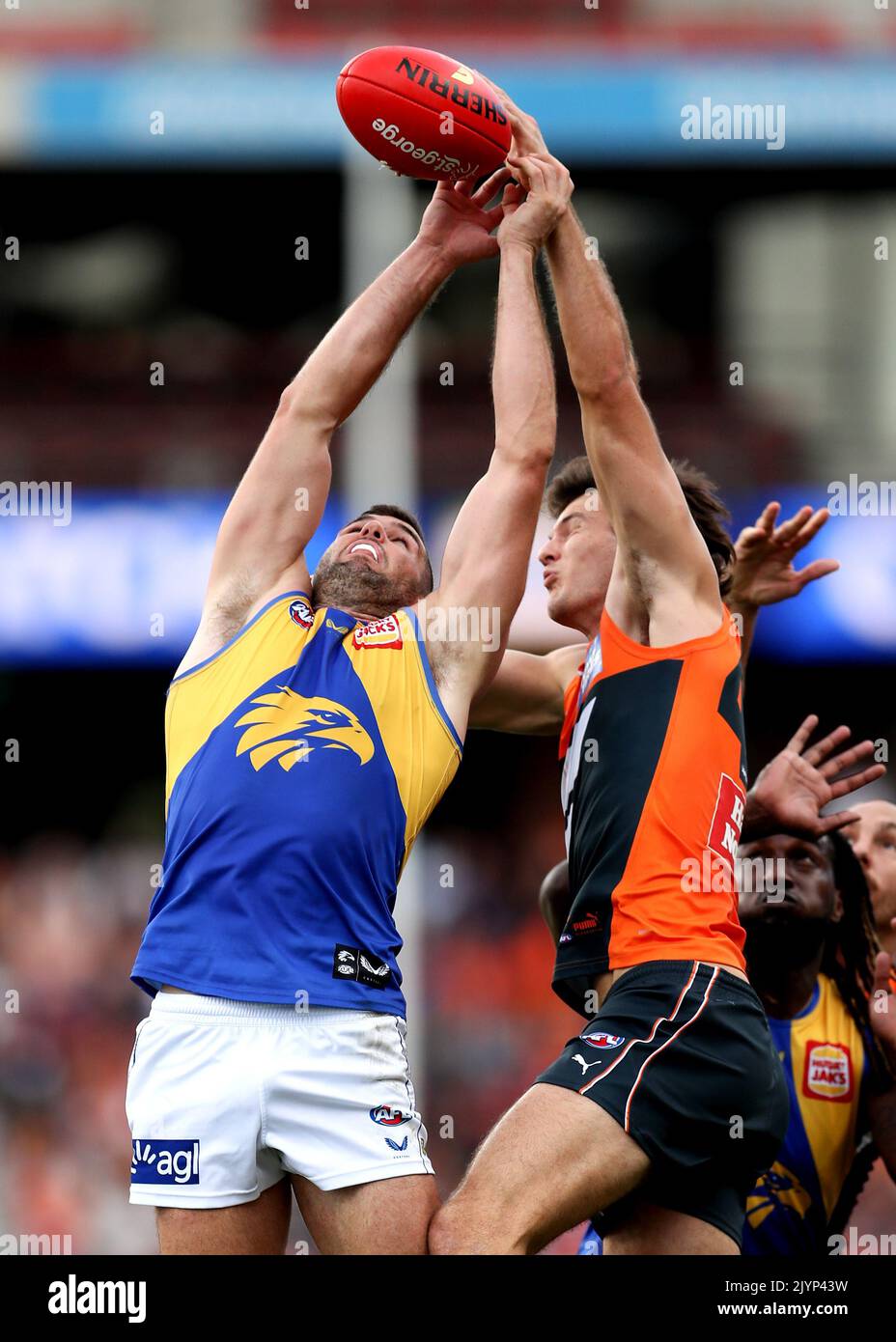 Jack Darling of the Eagles contests the ball with Jack Buckley of the ...