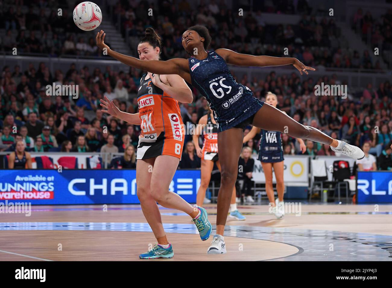 Mwai Kumwenda of the Vixens (right) and Sam Poolman of the Giants in ...