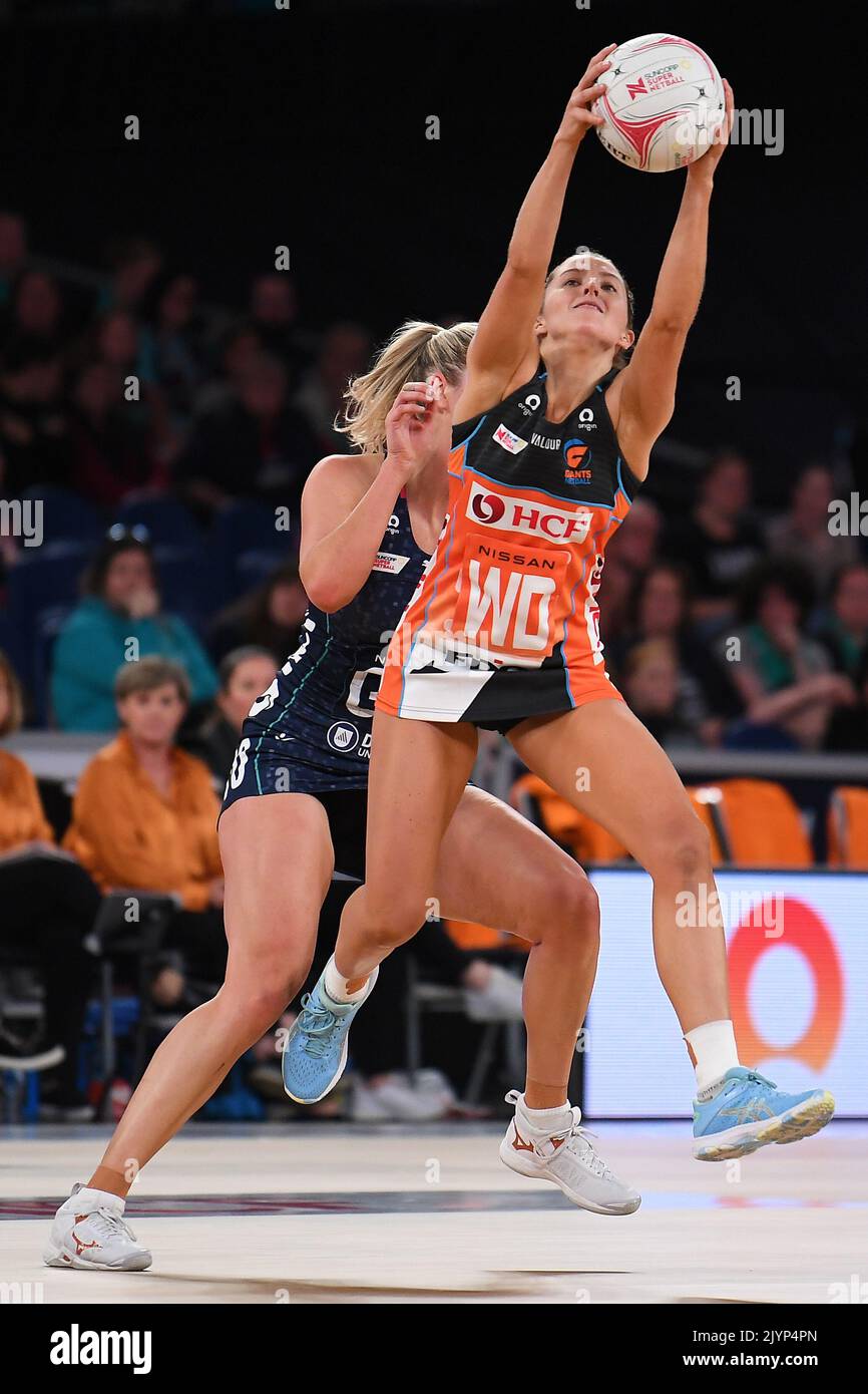 Amy Parmenter (right) of the Giants catches the ball during the Round 4 ...
