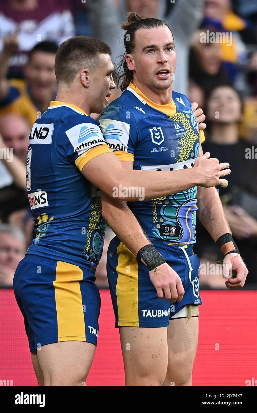 Clint Gutherson of the Eels celebrates scoring a try during the Round ...