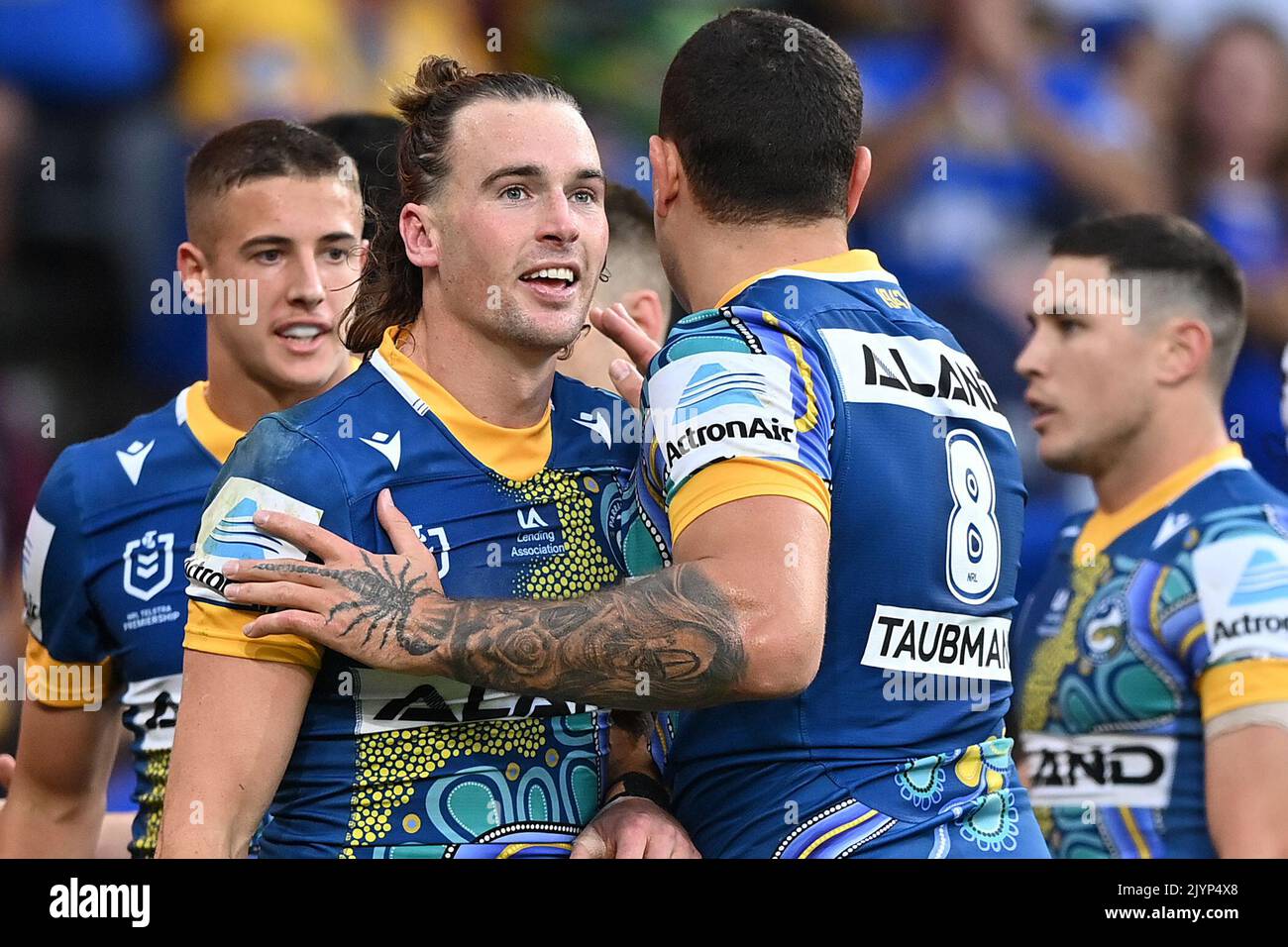 Clint Gutherson of the Eels celebrates scoring a try during the Round ...
