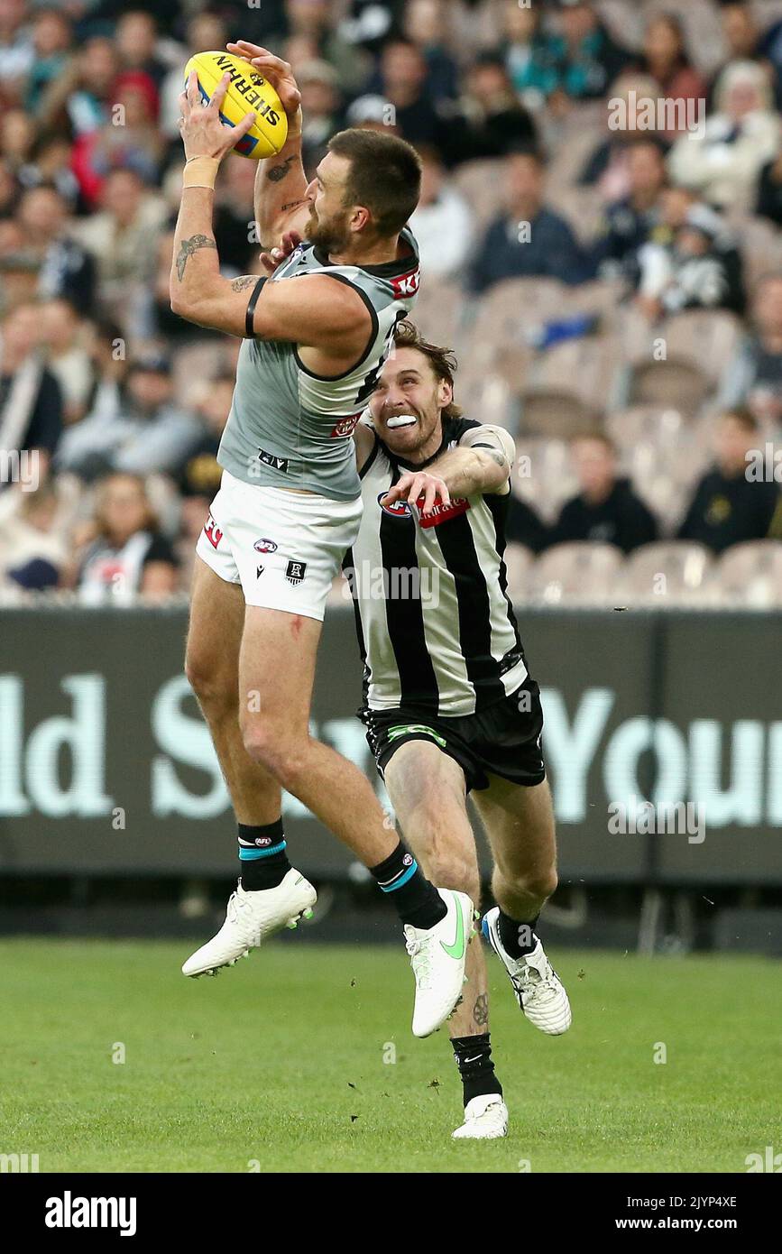 Charlie Dixon of the Power takes a mark during the Round 10 AFL match ...