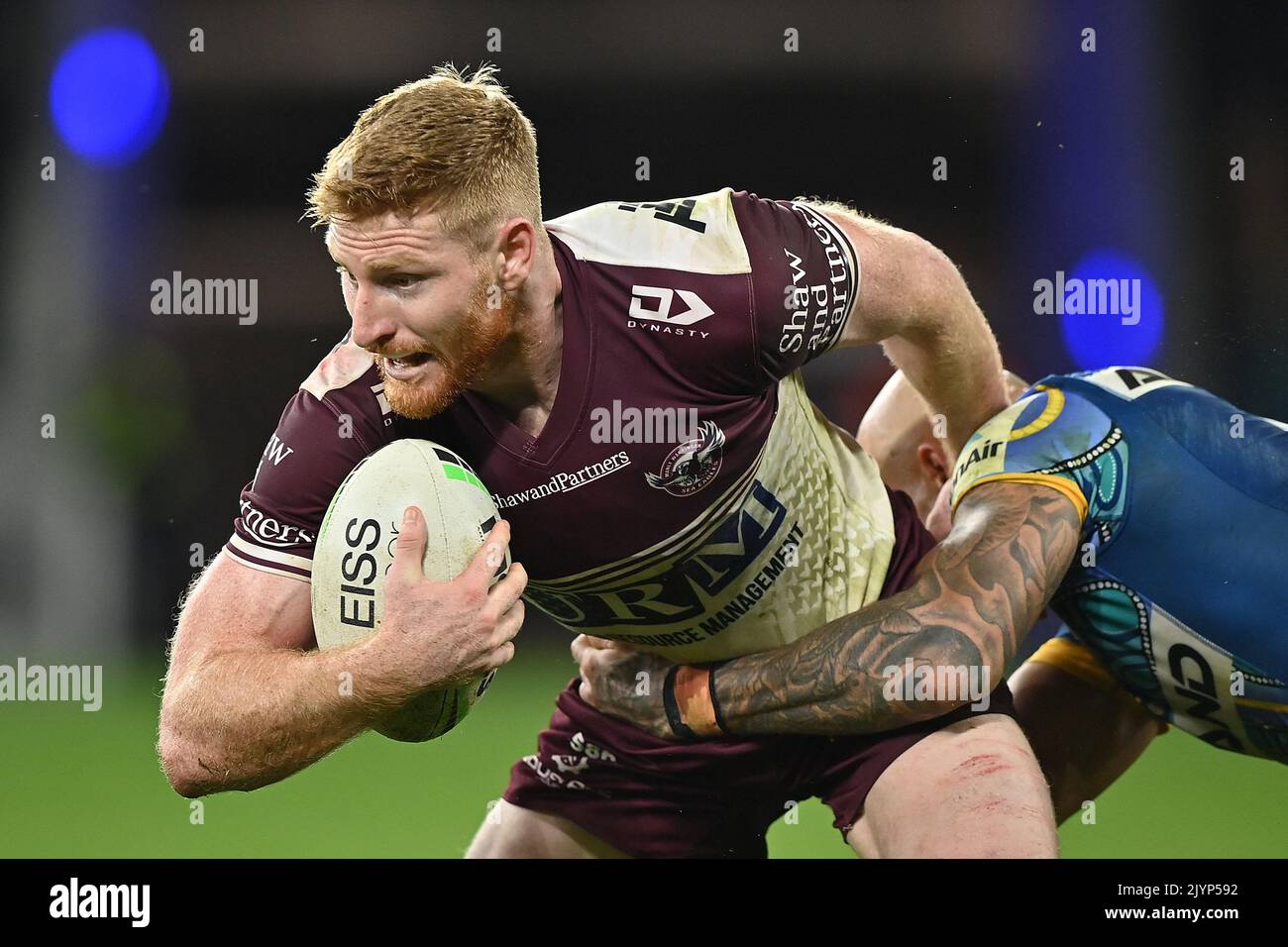 Blake Ferguson of the Eels tackles Brad Parker of the Sea Eagles during ...