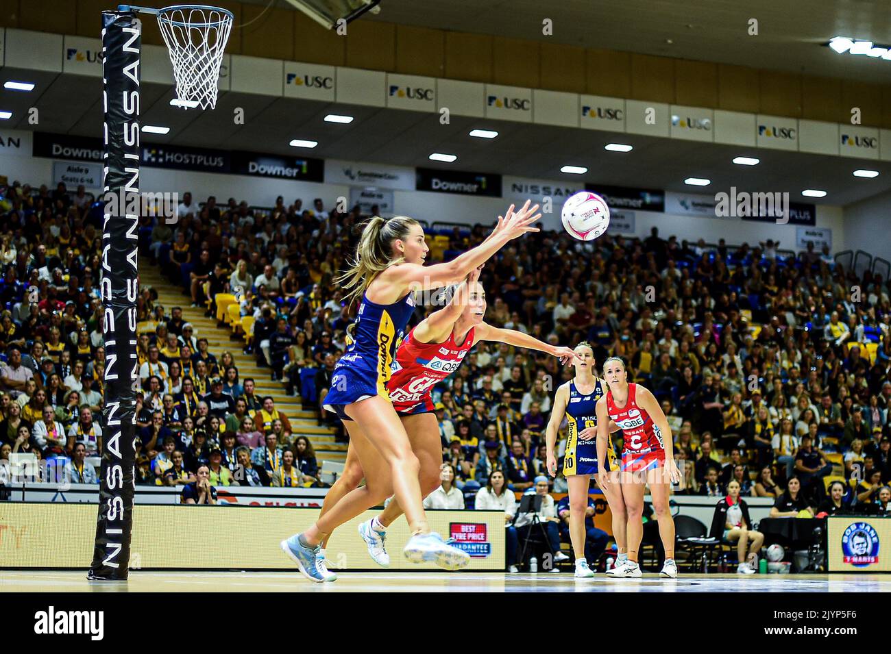 Cara Koenen of the Lightning and Sarah Klau of the Swifts compete for ...