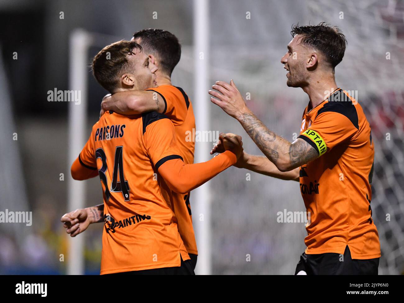 Alex Parsons (left) of the Roar celebrates scoring a goal with Scott ...