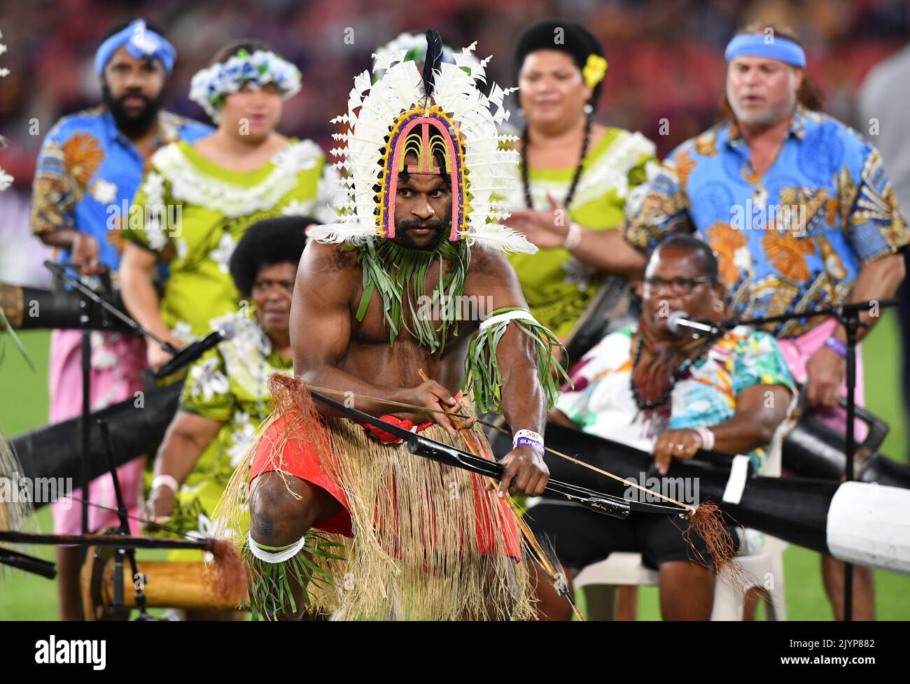An Torres Strait islander performer is seen during the Round 12 NRL ...