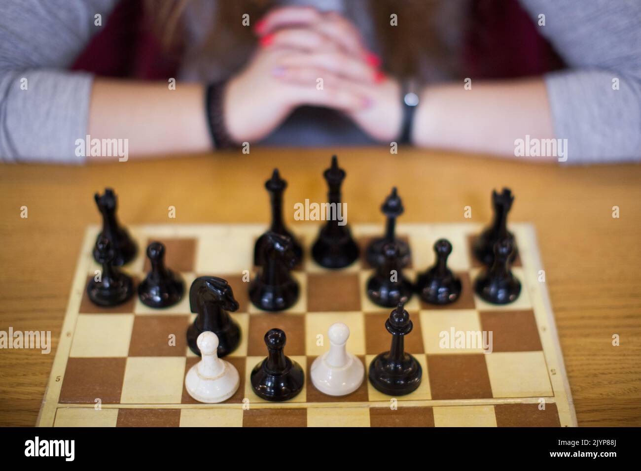 chess player thinking while playing game Stock Photo - Alamy