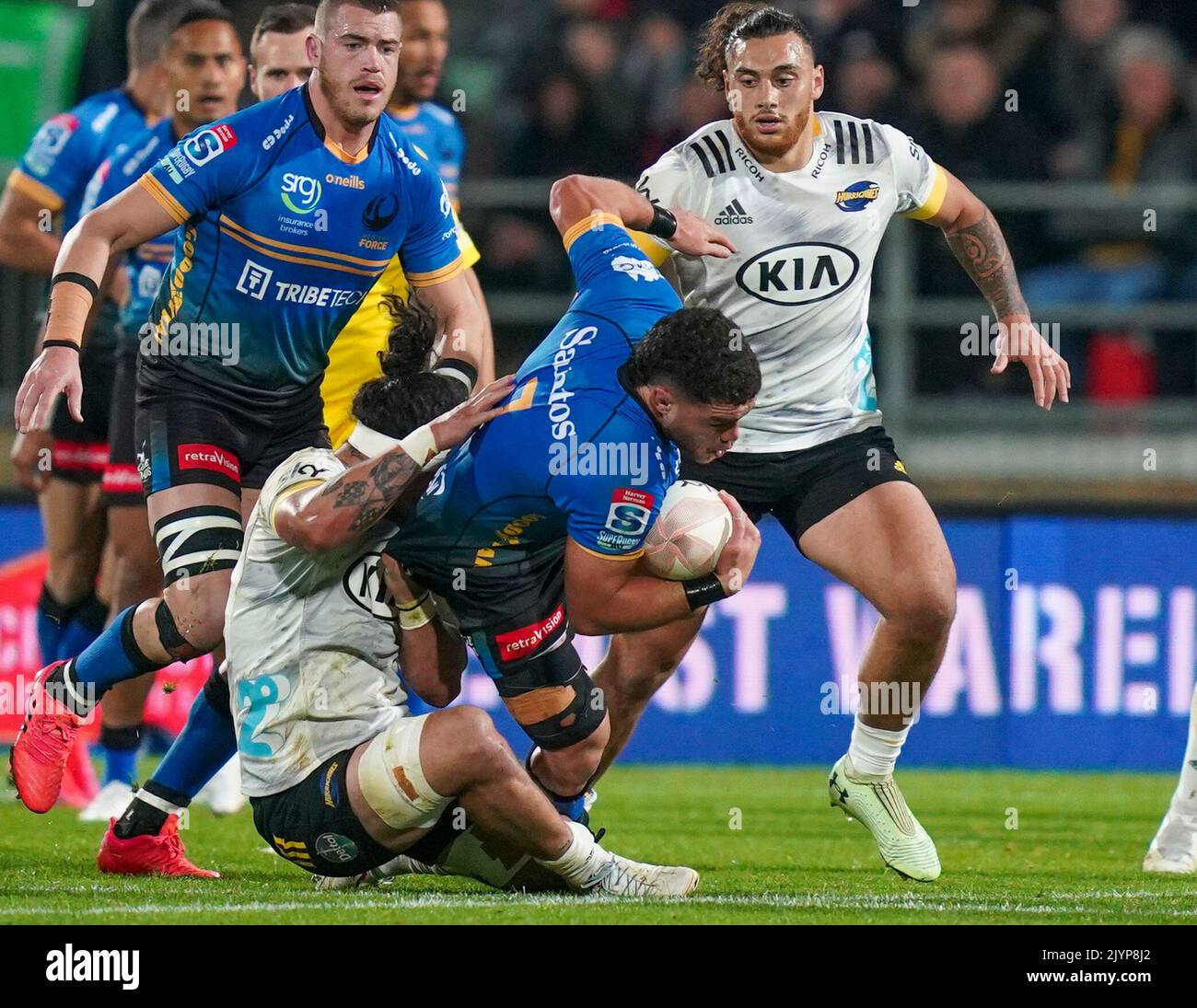 Kane Koteka of the Force is tackled during the Round 3 Trans-Tasman ...