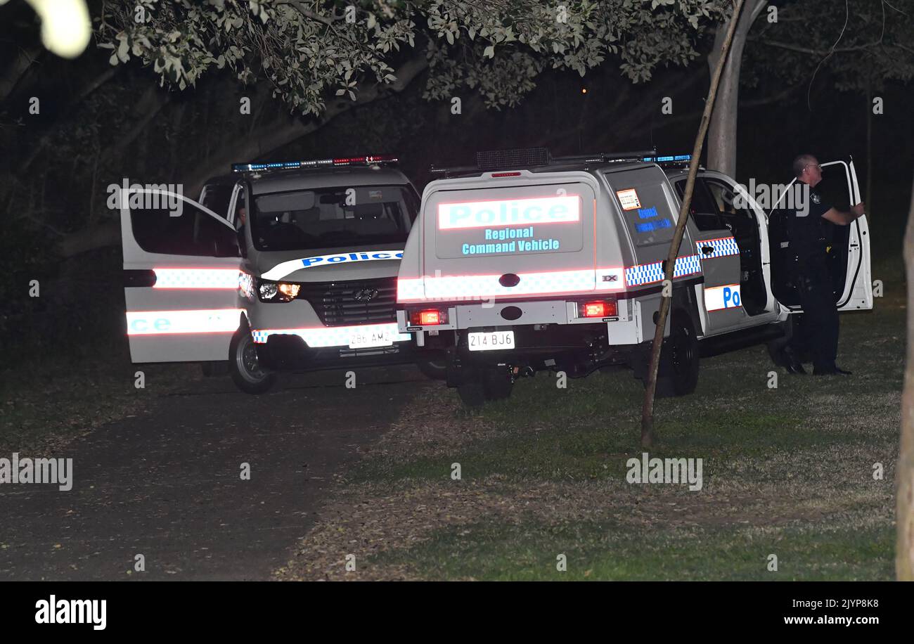 Queensland Police officers are seen at the scene of a shooting in the ...