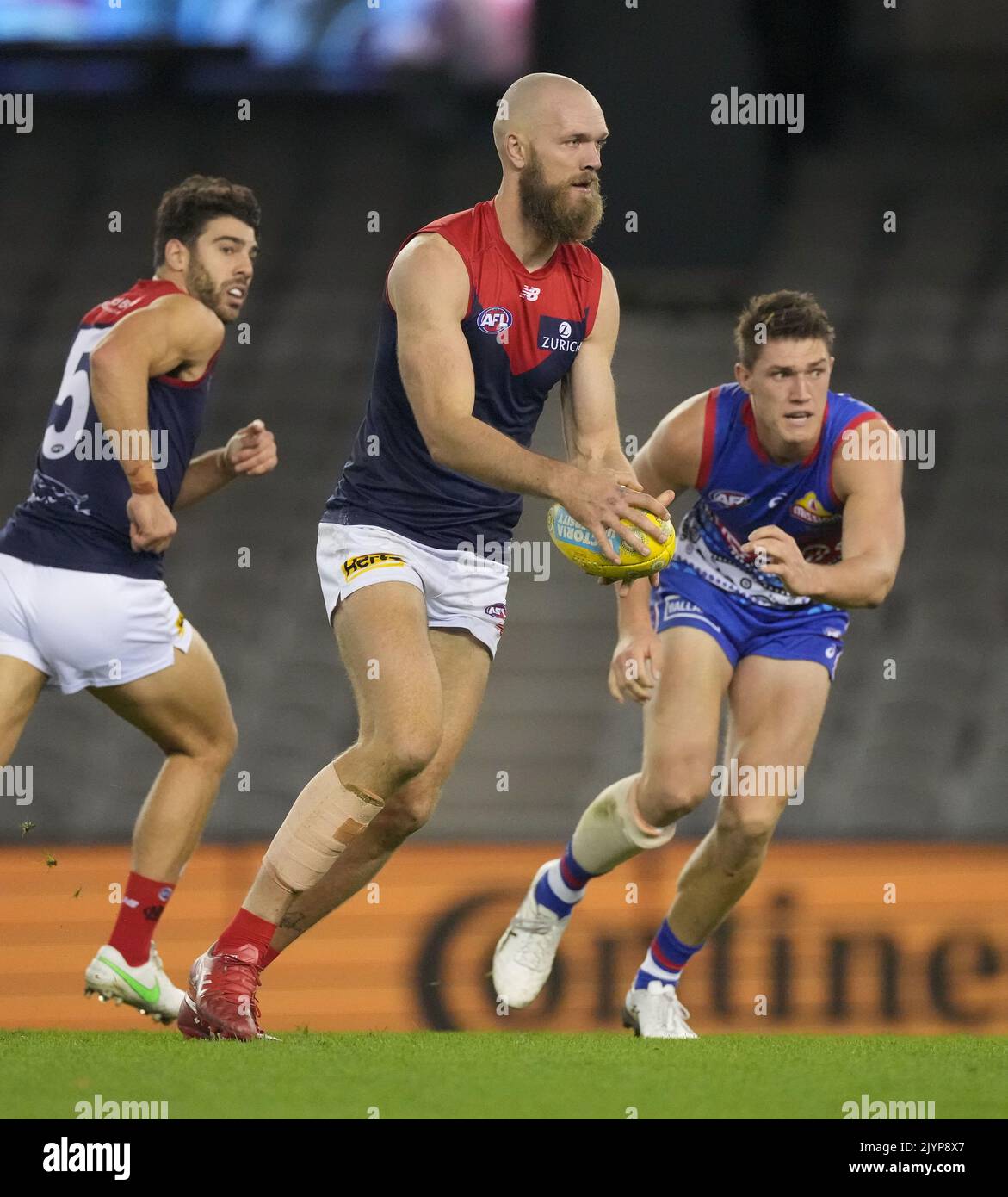 Max Gawn of the Demons runs with the ball during the Round 11 AFL match ...