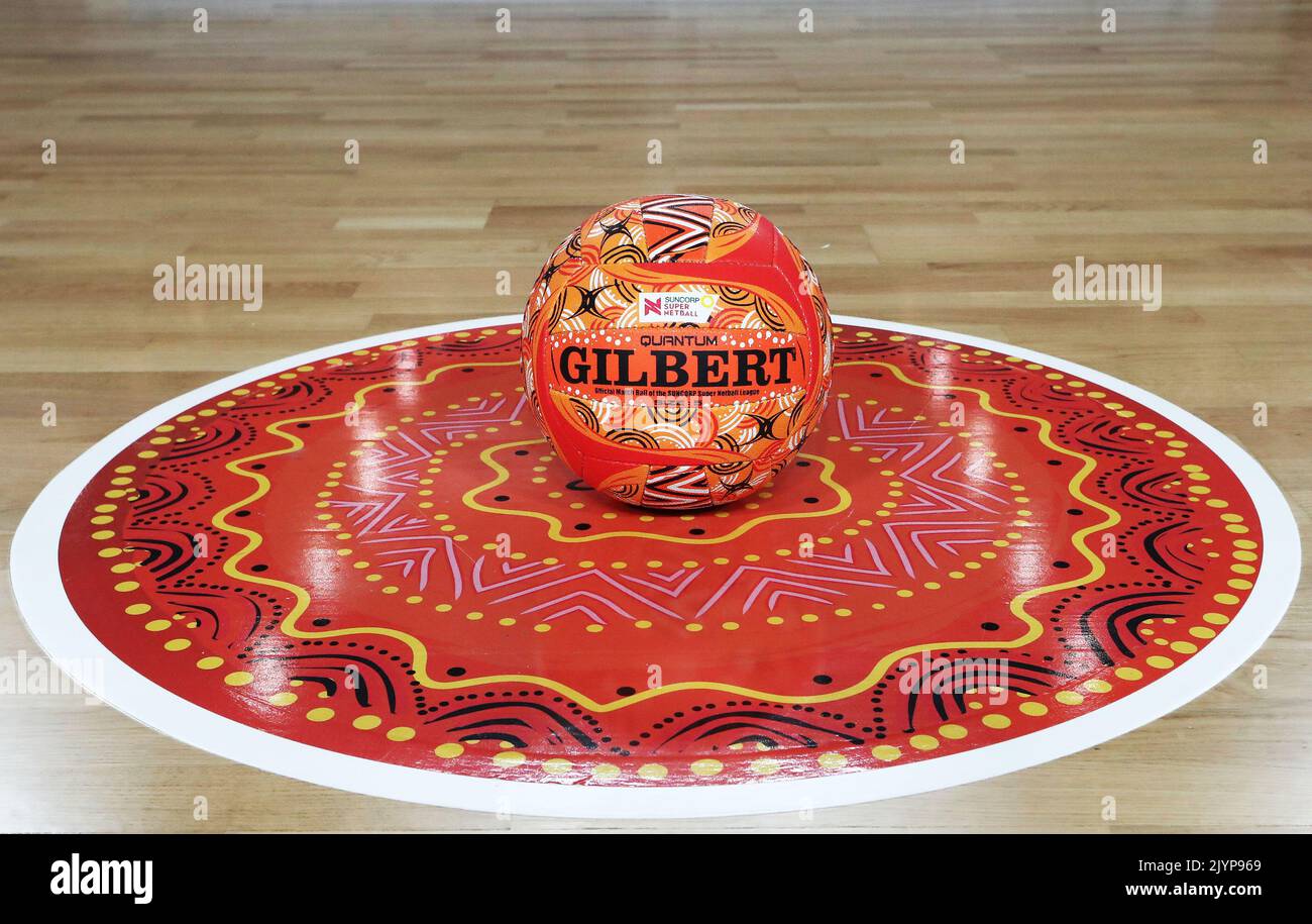 Aboriginal artwork is shown on the ball and centre circle as part of ...