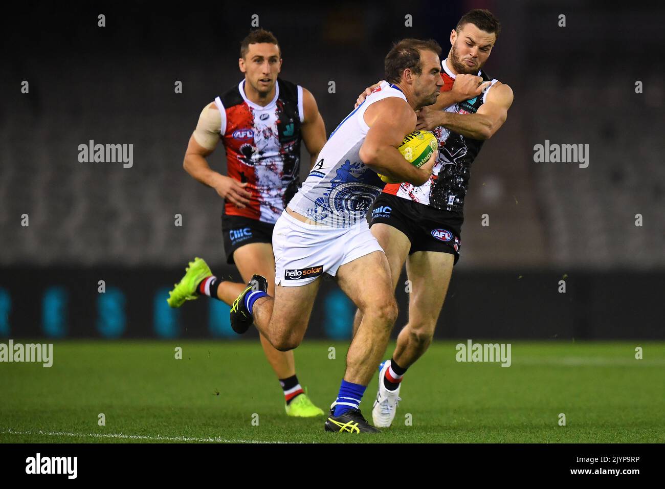 Ben Cunnington of North Melbourne (centre) in action during the Round ...