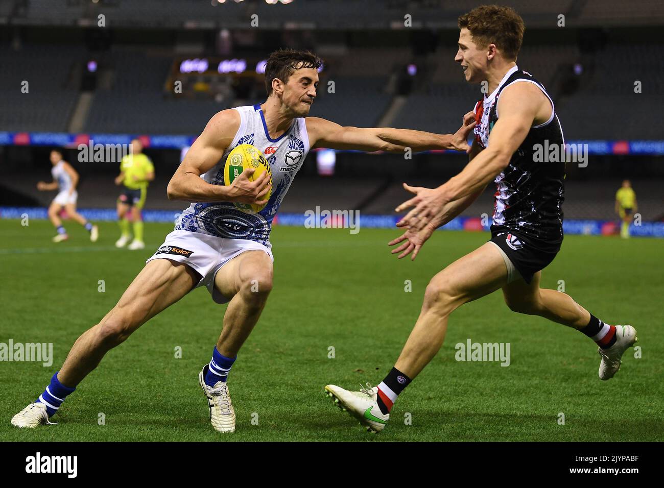Taylor Garner of North Melbourne (left) in action during the Round 11 ...