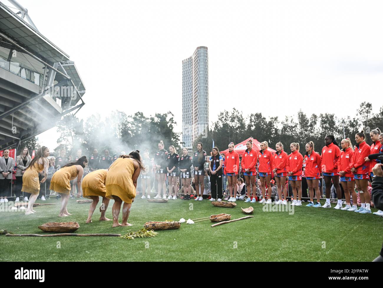 The Swifts and the Magpies watch on during an indigenous smoking ...