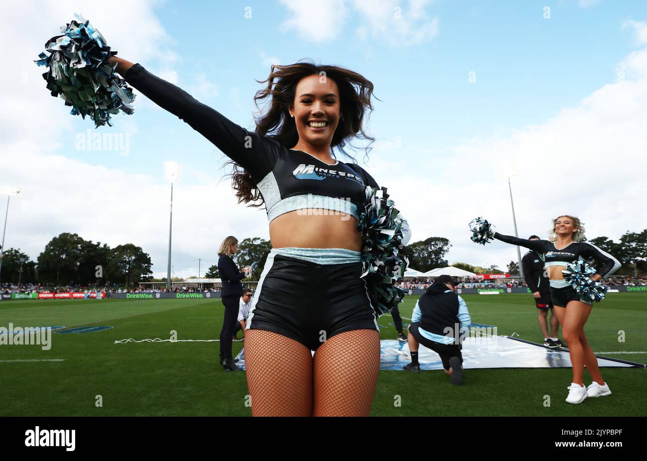 A Sharks cheerleader during the Round 12 NRL match between the Cronulla ...