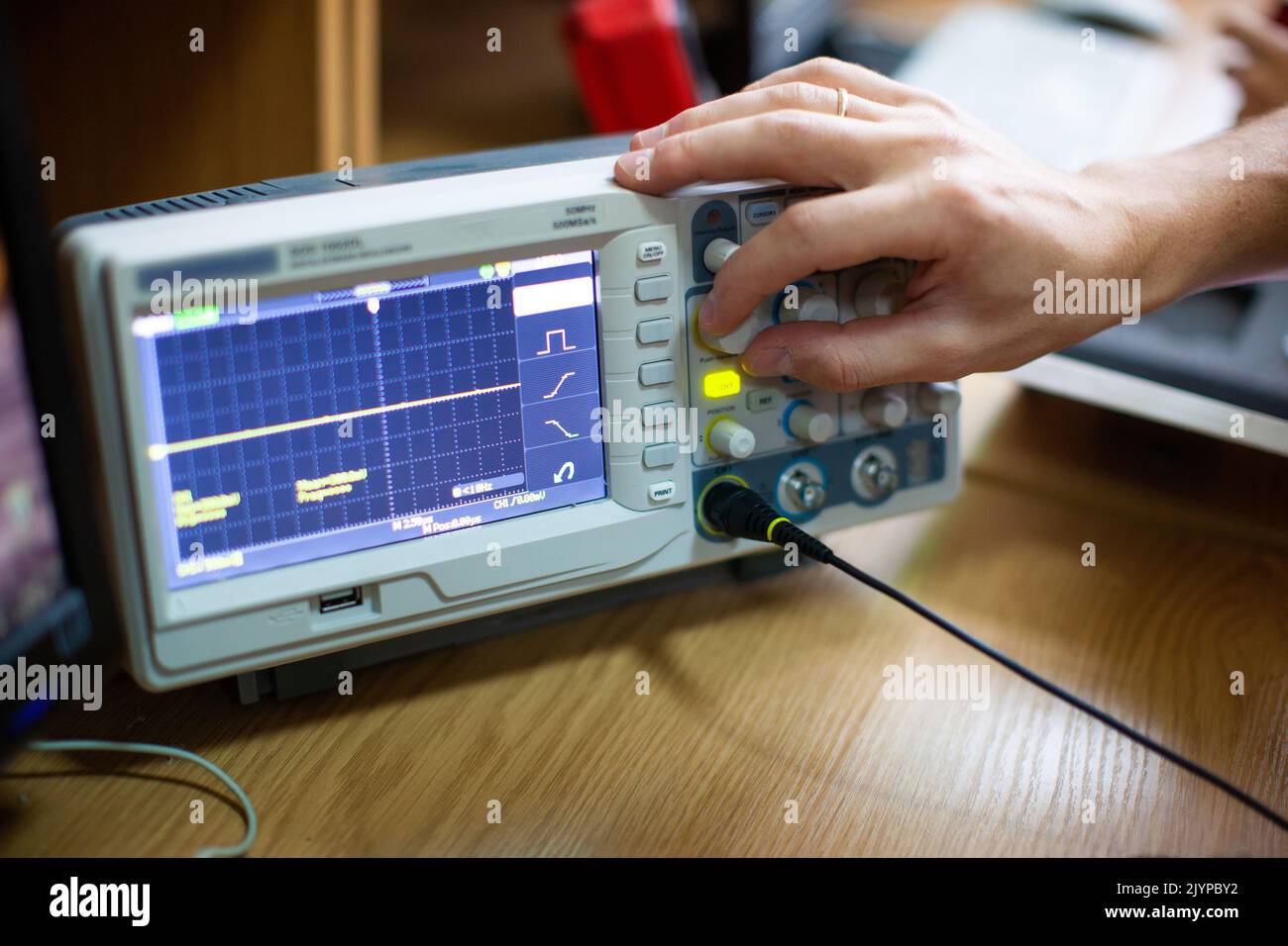 engineers work with electrical measuring devices Stock Photo - Alamy
