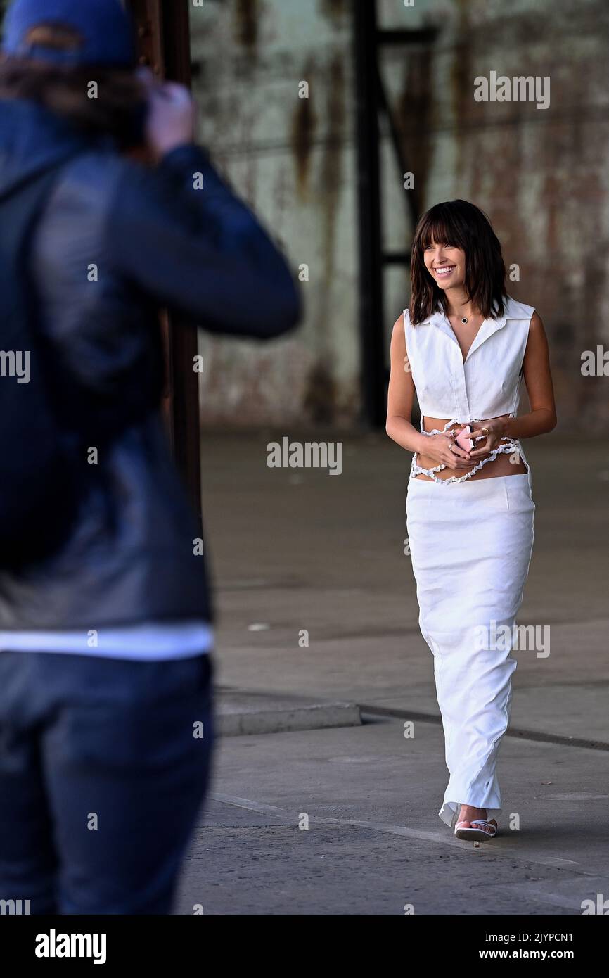 Sarah Ellen (wearing Christoper Esber runway look) poses for a ...