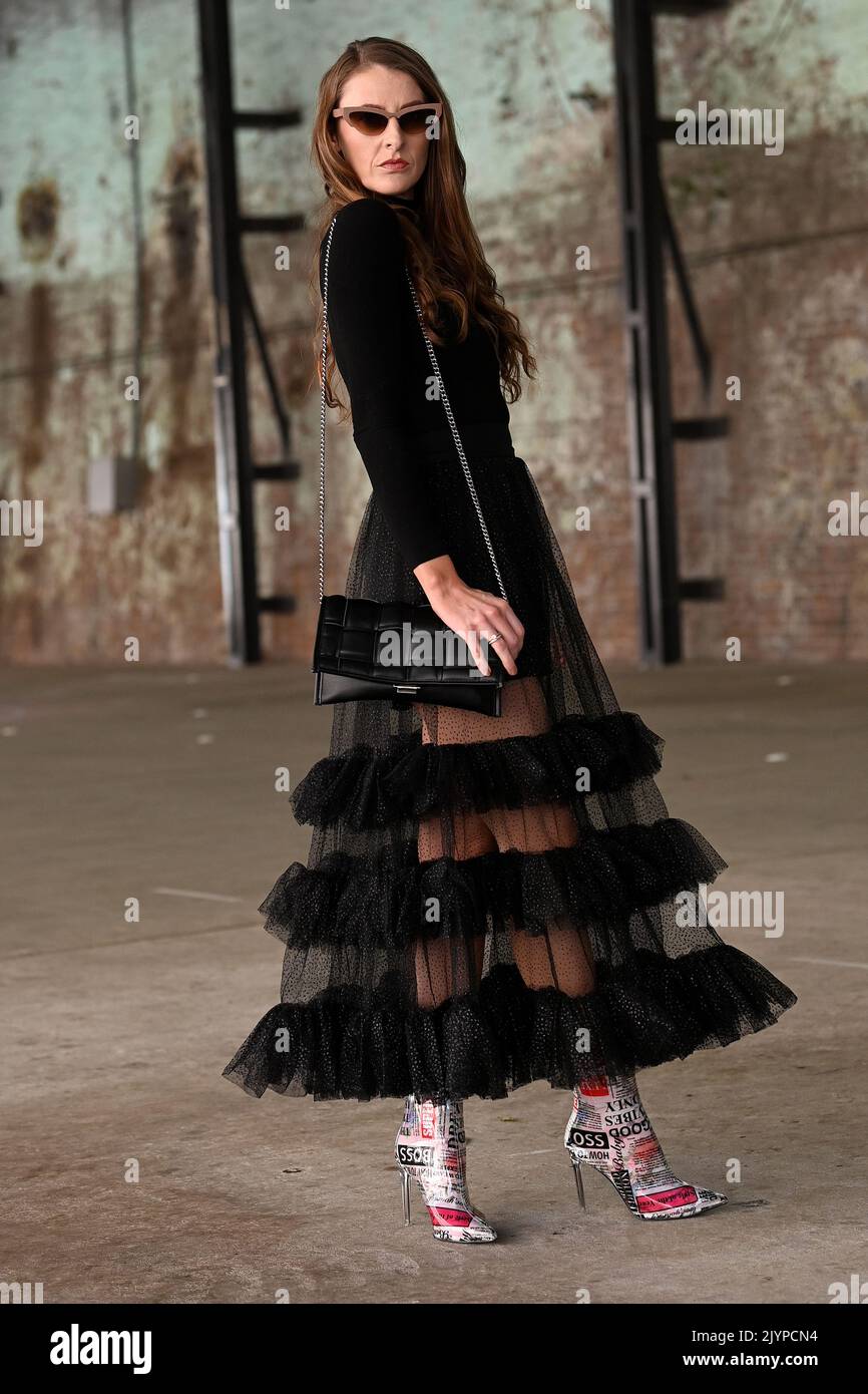 Jessica-Grace (wearing Sheike and Steve Madden boots) poses for a ...