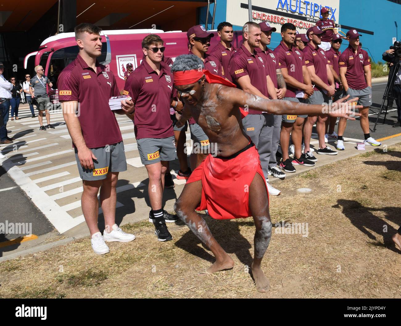 The Queensland Maroons State of Origin team is seen being greeted by ...