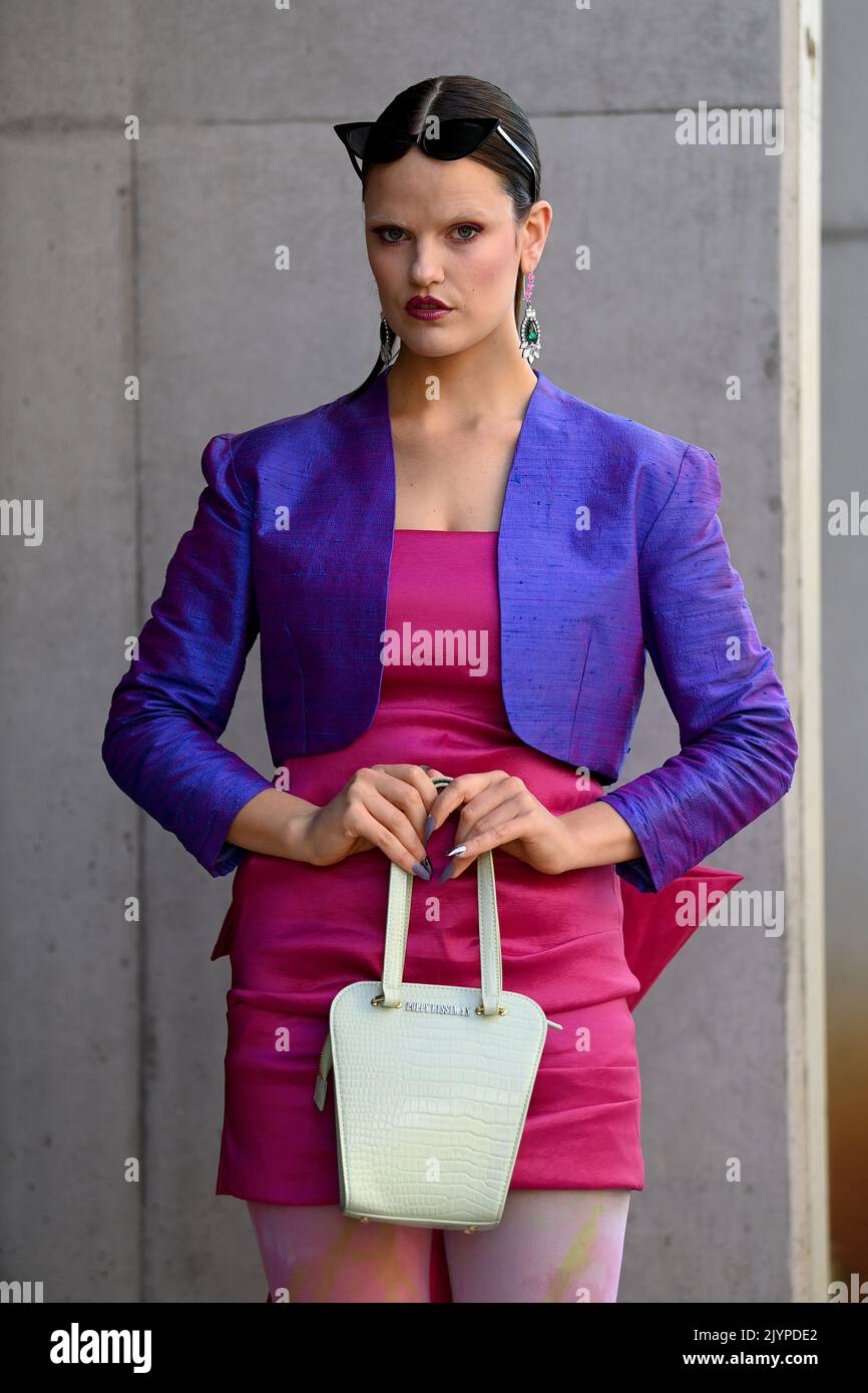 Millie Sykes (wearing Nookie dress, Poppy Lissiman bag and Victoria ...