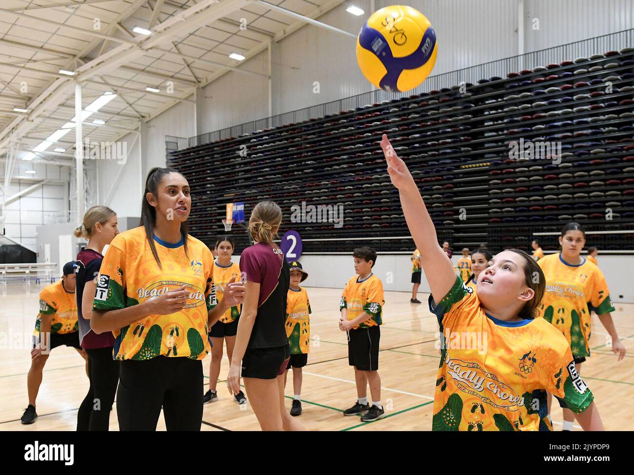Australian beach volleyballer Taliqua Clancy (left) reacts with ...