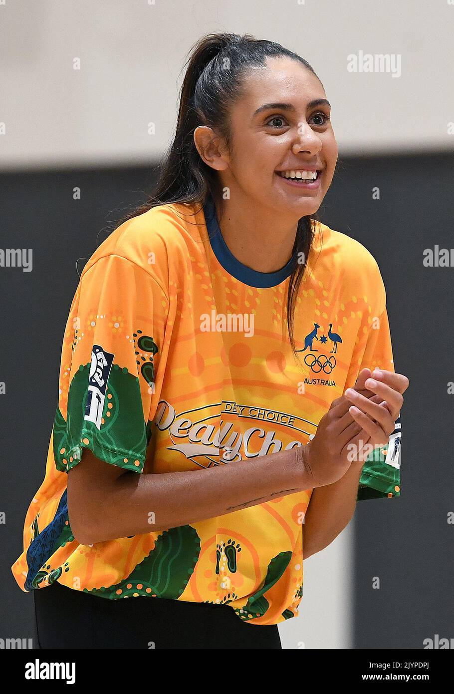 Australian beach volleyballer Taliqua Clancy is seen with students ...