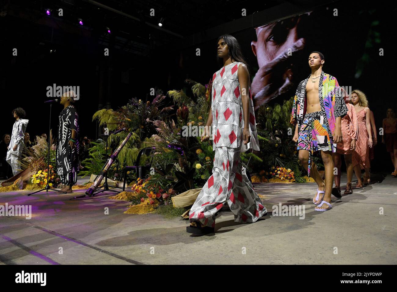 Models walk the runway during the First Nations Fashion + Design show ...