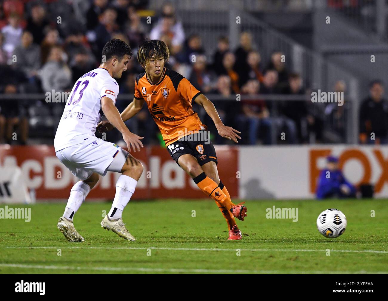 Riku Danzaki of the Roar (right) and Luke Bodnar of the Glory compete for the ball during the A ...