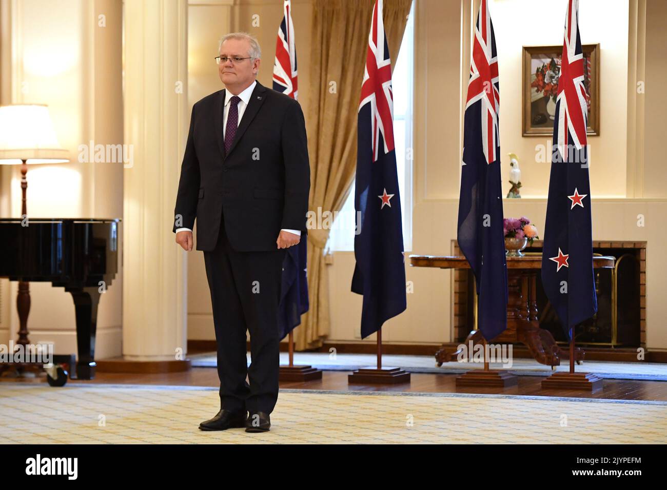 Australia’s Prime Minister Scott Morrison waits for New Zealand’s ...