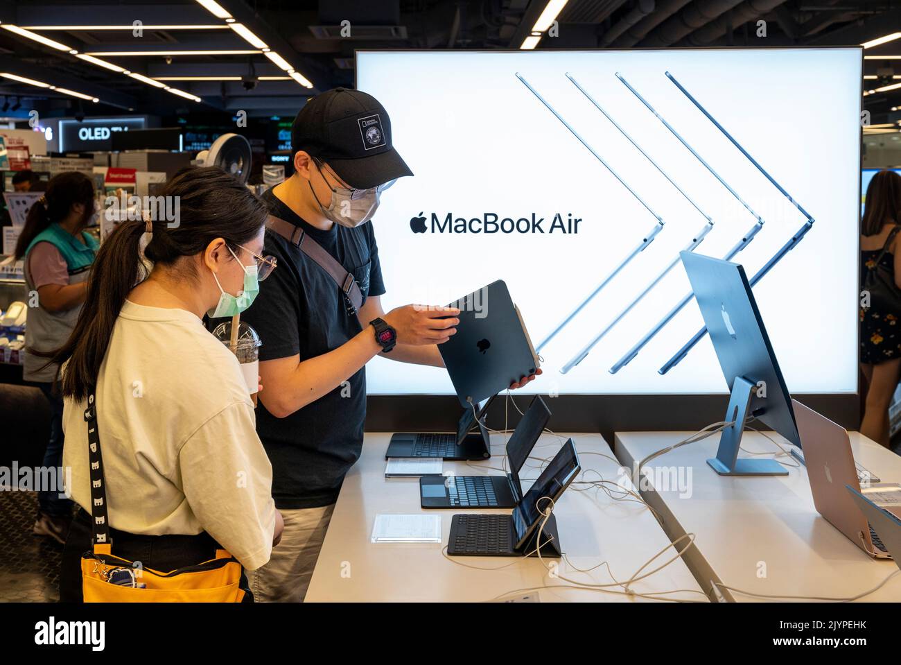 Shoppers are seen testing and using American multinational technology ...